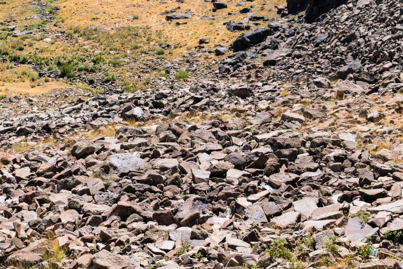 Sharp-angled Stones at the Foot of a Cliff in the Mountains of Armenia ...