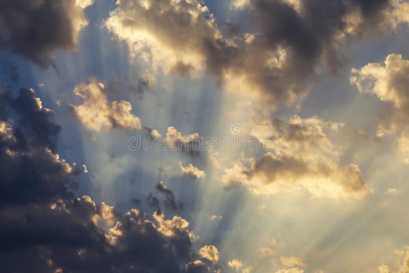 Sun Rays through Dark Clouds Stock Image - Image of color, background ...