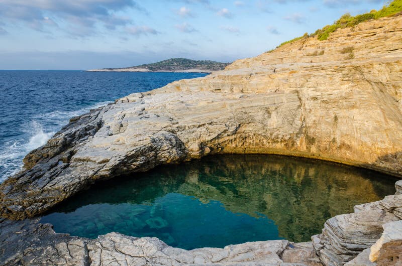 Natural basin stock image. Image of shore, clouds, stone - 26639145