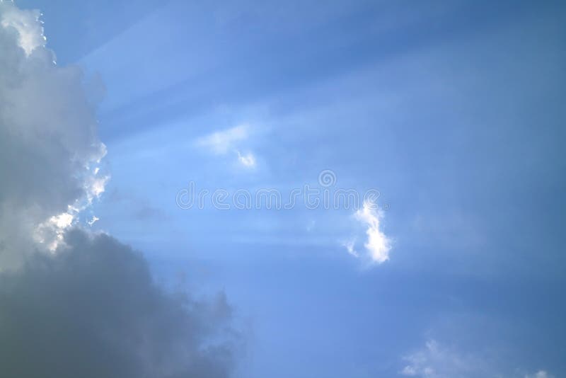 Natural Beauty of Sun Rays Shining through the Clouds on Blue Sky Stock ...
