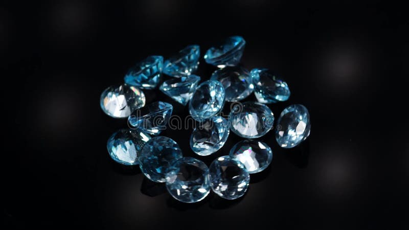 Natural Blue Topaz Gemstones on the Dark Background Turning Table Stock ...