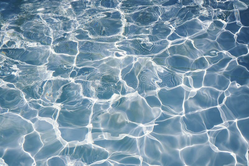 Natural Blue Water Surface with Bright Sun Light Reflections. Blue ...