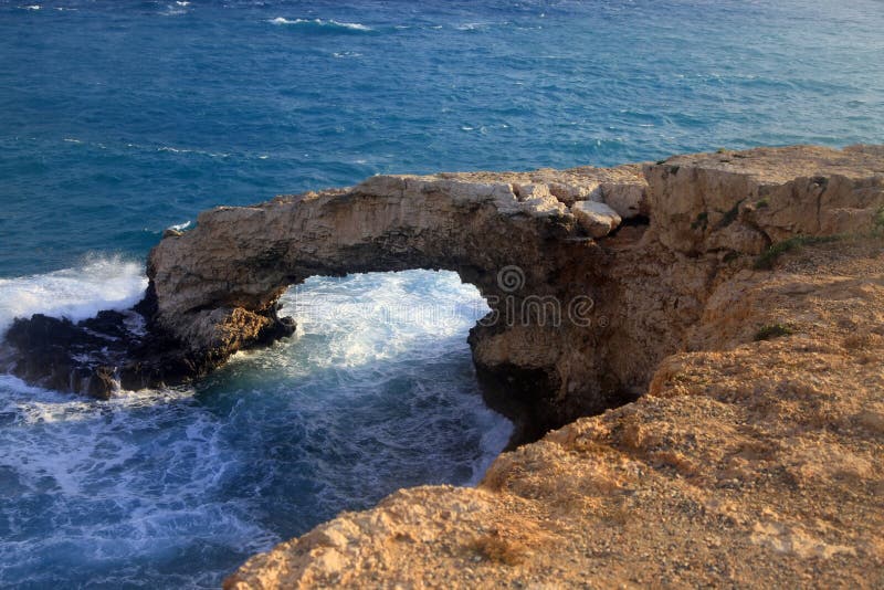 Natural bridge, Cyprus stock photo. Image of people, coastline - 94381588
