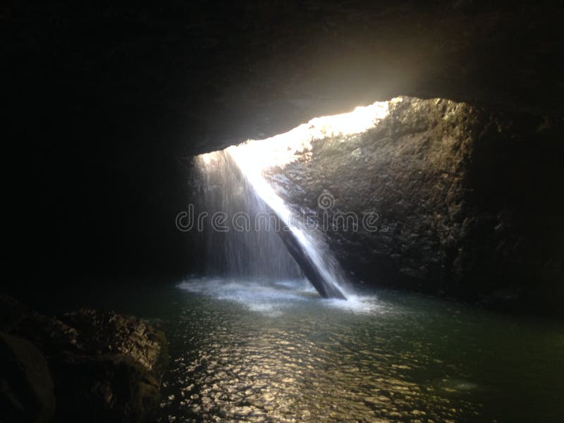 Natural Bridge Waterfall in Queensland Stock Image - Image of ...