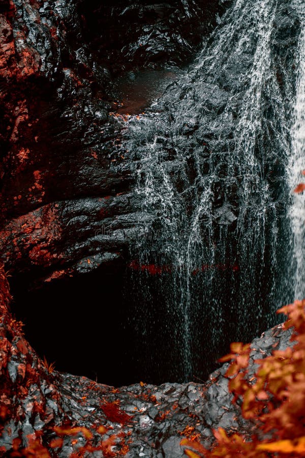 Natural Bridge Waterfall stock photo. Image of beautiful - 64314478