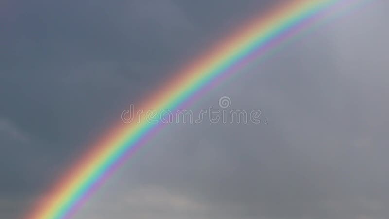 Natural Colors of the Rainbow Against the Background of Dark Rain ...