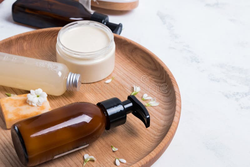 Natural Cosmetics in Small Bottles on the White Marble Table Stock ...
