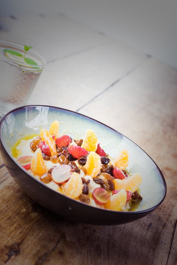 Natural Detox Breakfast Idea - Water, Lemon, Oatmeal, Fruit Stock Image ...