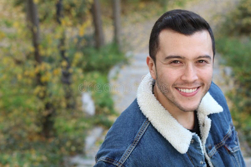 Natural Ethnic Man Smiling Outdoors with Copy Space Stock Image - Image ...