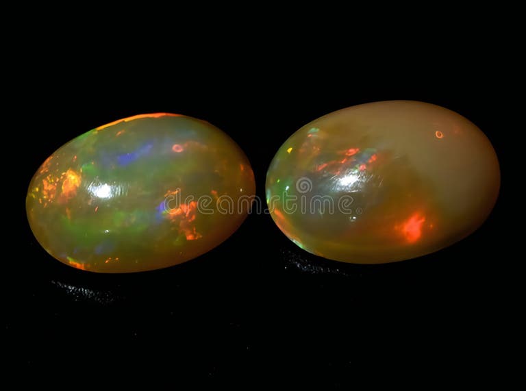 Natural Fire Rainbow Orange Opal Gem on the Background Stock ...