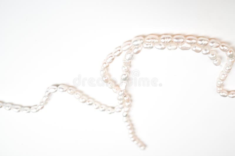 Natural Freshwater Round Pearl Beads on White Background. String of Pearls Top View Stock Photo ...
