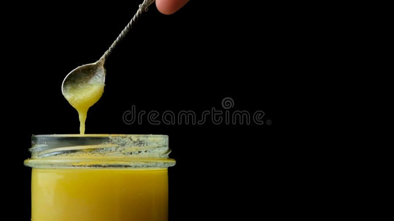 Natural Ghee Healthy Oil, Black Background Stock Video - Video of ...