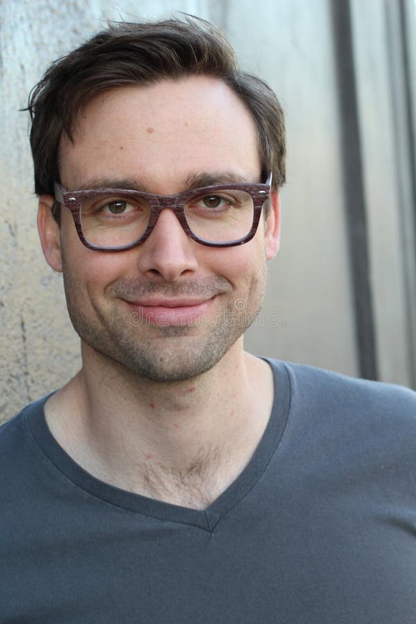 Natural Good Looking Young Man Smiling Over Blue Background Stock Photo ...