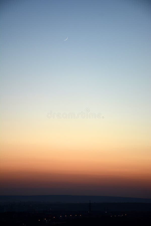 Natural Gradient of Colors after Sunset and a Young Moon in the Sky ...