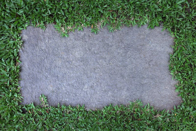 Natural Granite Stone with a Green Grass Frame Around it. Beautiful ...