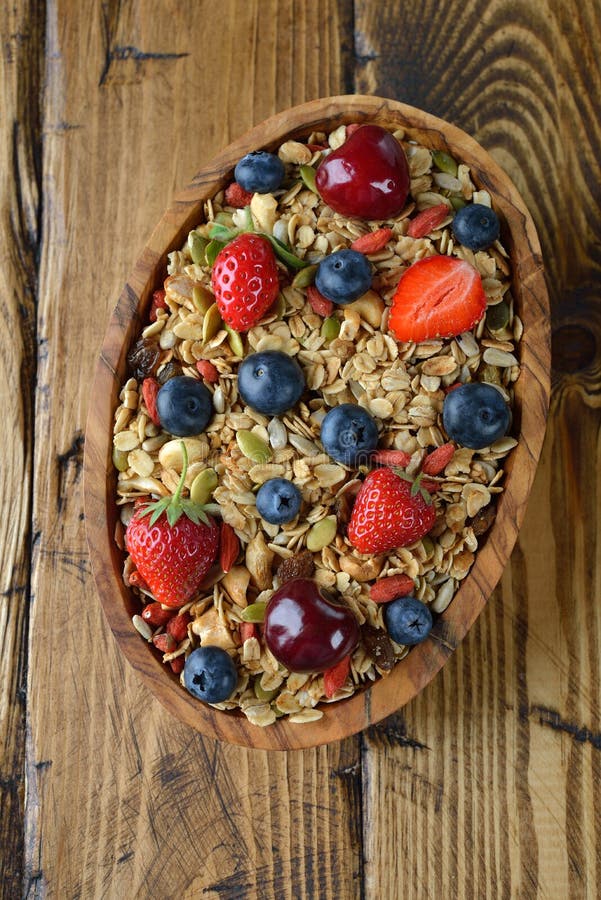 Natural granola with fruit stock image. Image of flakes - 117944709