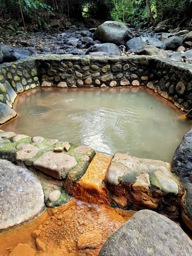 Natural Hot Spring Pool in the Middle of the River, Set Against a ...