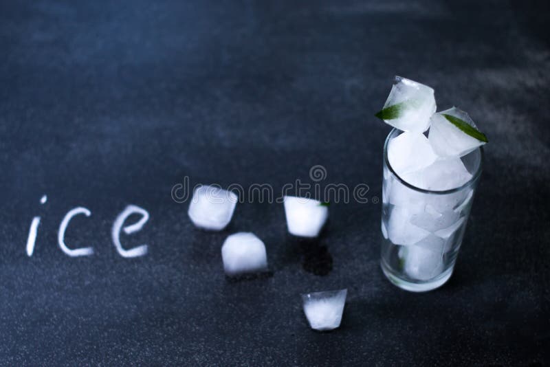 Natural Ice in a Glass on a Black Matte Background. Stock Image - Image ...