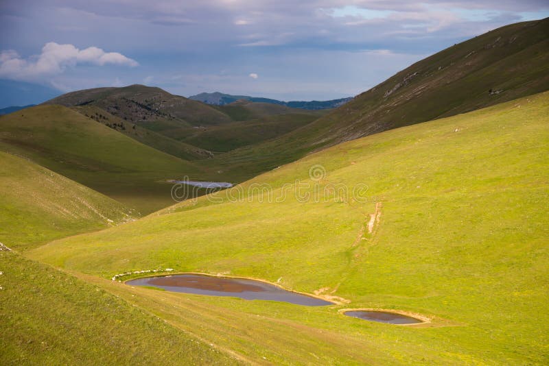 Natural Landscape with Green Pastures on Gentle Hills Stock Photo ...