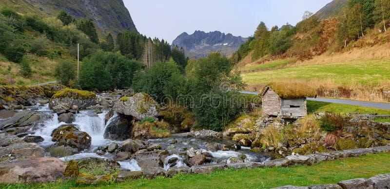 Natural Landscape in the Mountains. a Charming Little Cottage on a ...