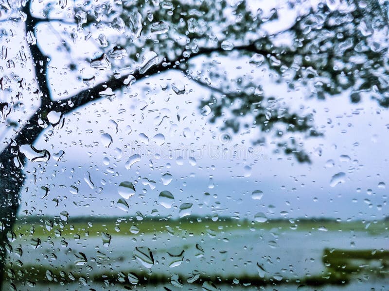 Natural Landscape Outside the Window with Rain Drops on the Glass Stock ...