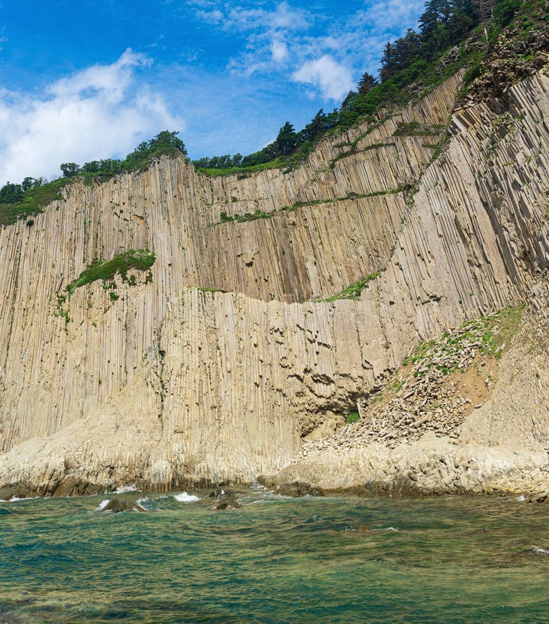 Natural Landscape with a Sheer Cliff Folded Columnar Basalt on the ...