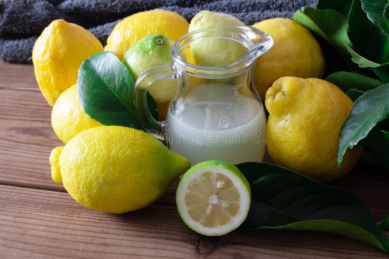 Natural Lemon Juice with Lemons Stock Image - Image of juice, flowers ...