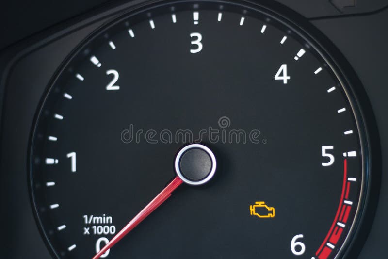 Natural Light. the Dashboard of the Car. the Engine Error Indicator ...