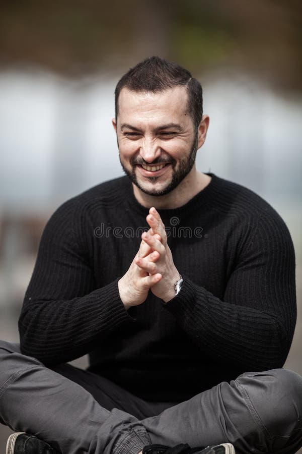 Natural Looking Guy Posing Outdoors, Wearing Casual Clothes Stock Photo ...
