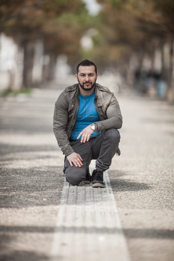 Natural Looking Guy Posing Outdoors, Wearing Casual Clothes Stock Image ...