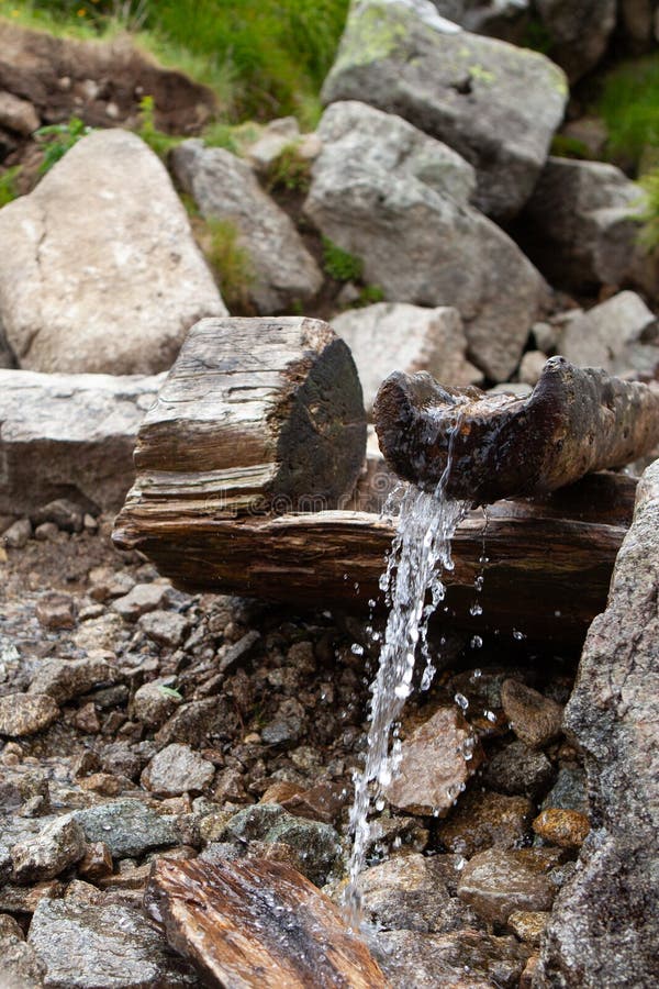 Natural Mountain Spring Water Source Stock Image - Image of wooden ...
