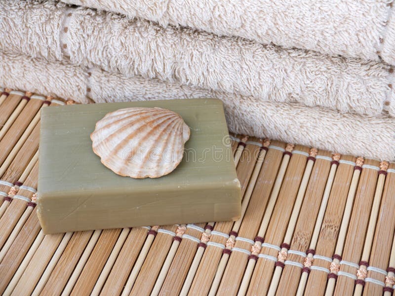 Natural Olive Soap Bar, Scallop Shell and Terry Towel Stock Photo ...