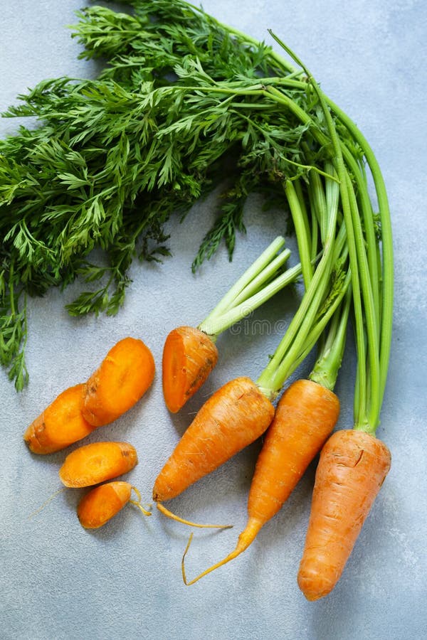 Natural organic carrots stock photo. Image of table - 147518872