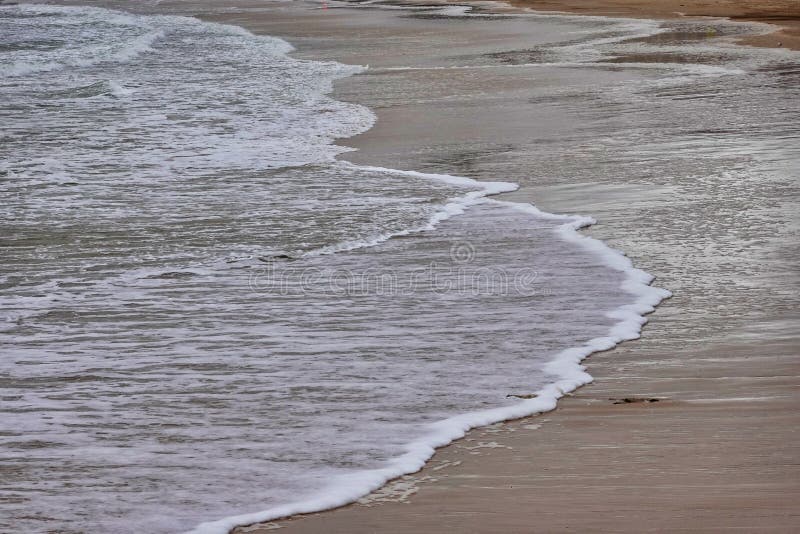 Wave Wash on Yellow Sand Ocean Beach Stock Image - Image of beach ...
