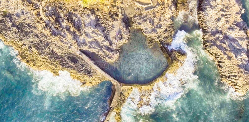 Natural Pool Along Ocean Rocks, Overhead View Stock Photo - Image of ...