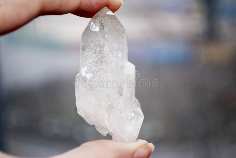 Natural Quartz Crystal Stone in Hand Stock Photo - Image of gemstone ...