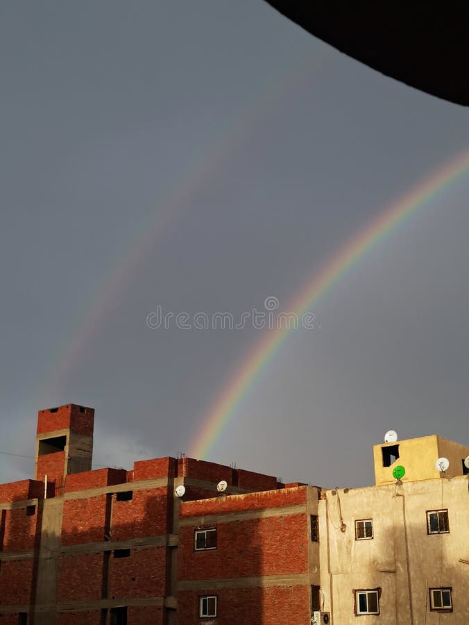 Natural Rainbow after a Heavy Rain Stock Image - Image of heavy ...