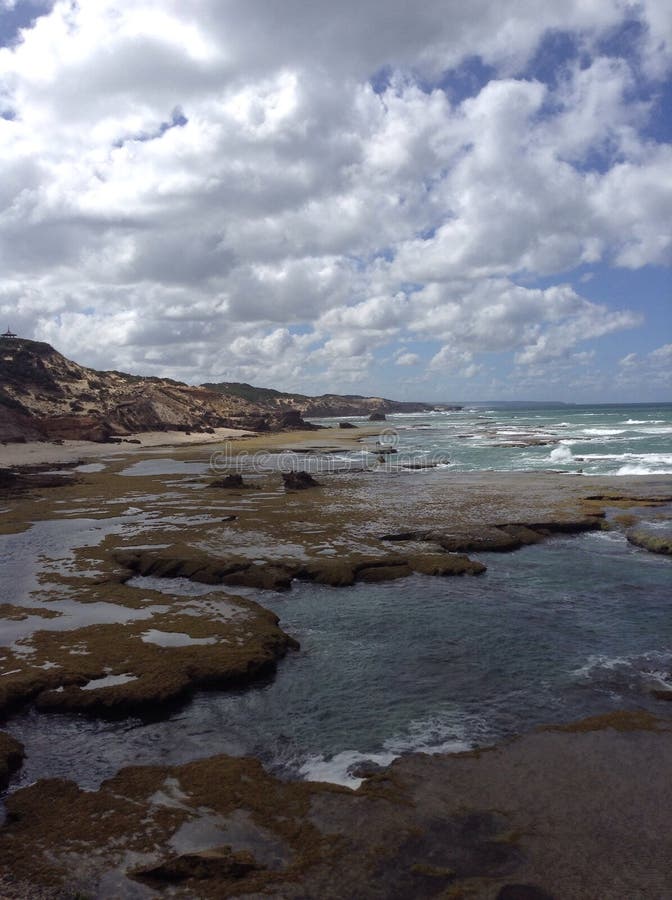 Natural Rock Pool on Beach stock photo. Image of beach - 57443894