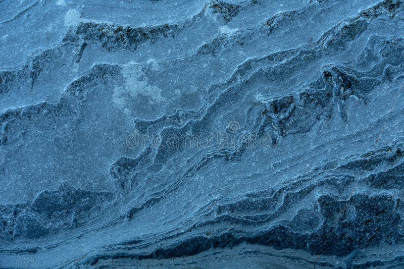 Natural Rock Texture of Air and Water Eroded Blue Rock Wall in a Beach ...