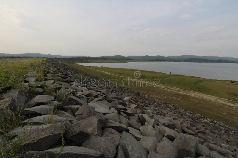 Natural rocks stock image. Image of water, hill, beach - 382665795