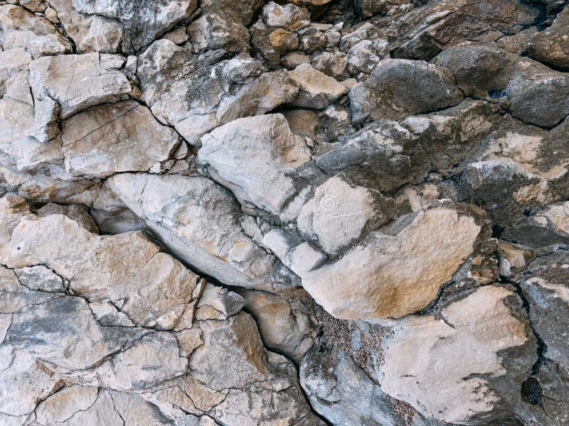 Natural Rocky Surface with Intricate Patterns and Textures in Beige ...