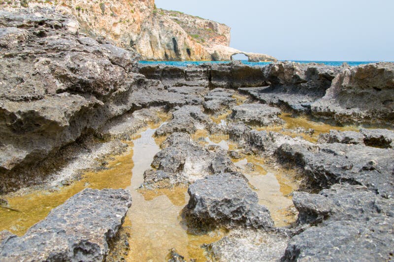 Natural Salt Pans with Water in Comino Island in Malta. Stock Image ...