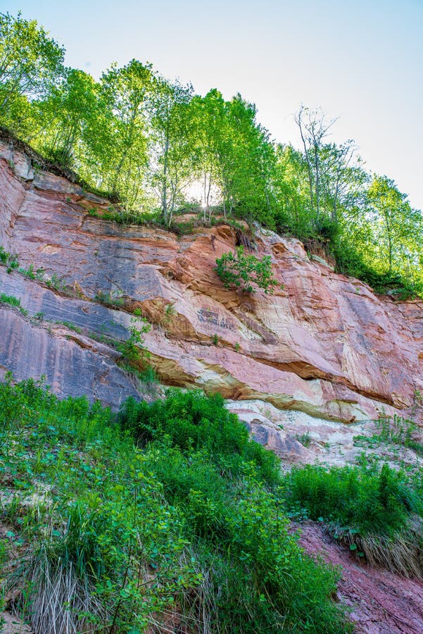Natural Sand Stone Cliffs on the Shore of the River in Forest Stock ...