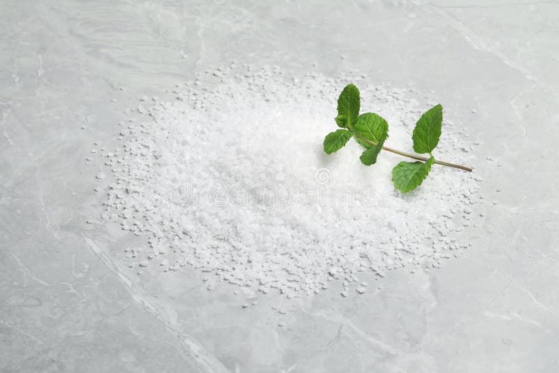 Natural Sea Salt on Light Grey Marble Table, Top View Stock Photo ...