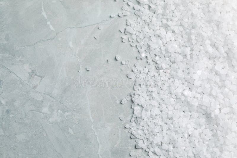 Natural Sea Salt on Light Grey Marble Table, Top View. Space for Text ...