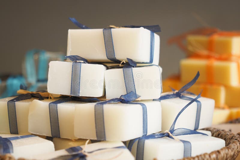 A Stack of White Soaps with Blue Ribbons in a Basket Stock Image ...