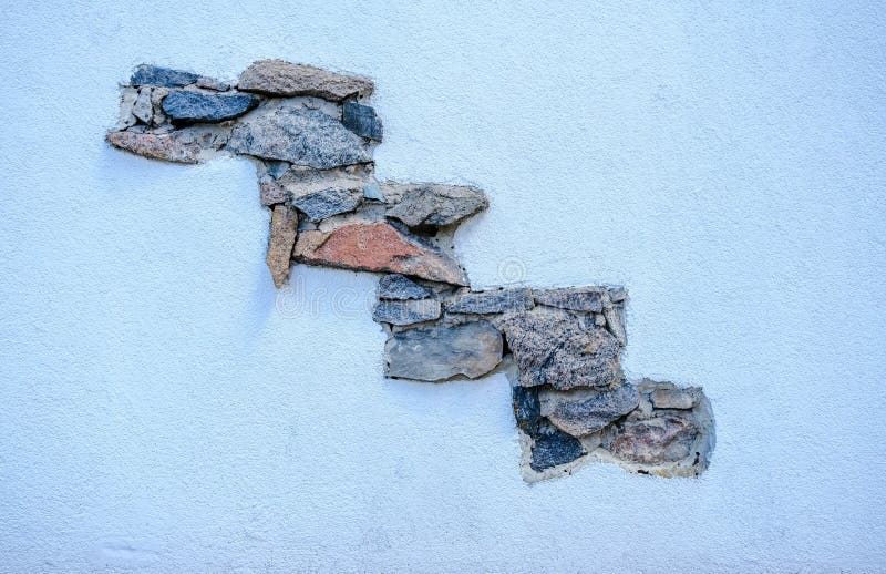 Natural Stone Embedded in the Wall of the House. Stock Photo - Image of ...