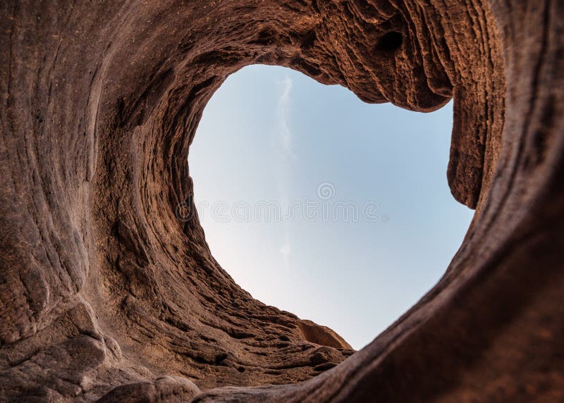 Natural Stone Hole Cave of Eroded Surface by Water with Blue Sky in ...
