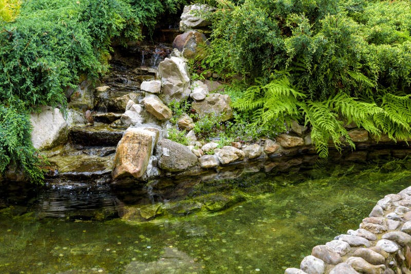 Natural stone landscaping stock photo. Image of landscaped - 95009622