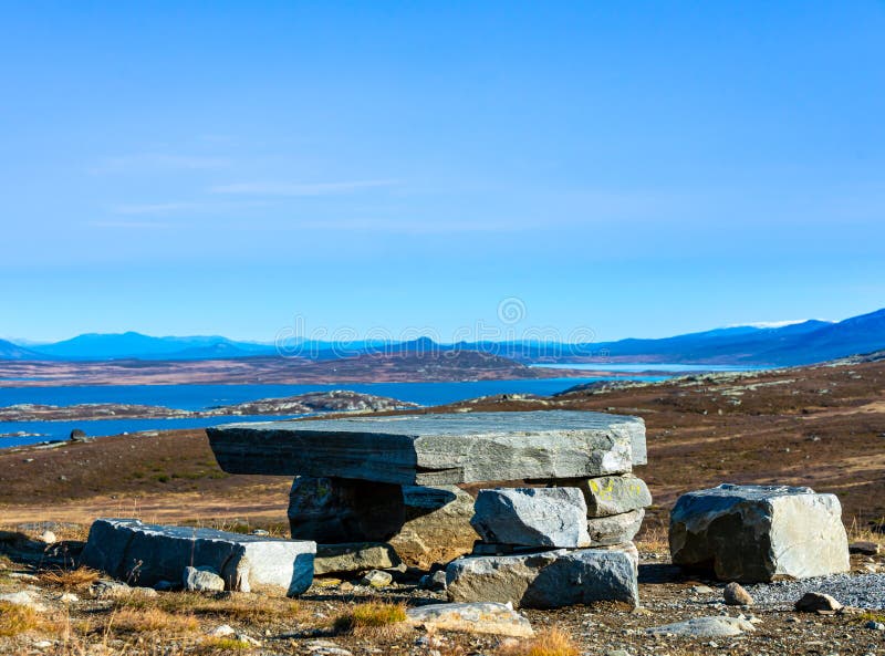 Rock Table with a Scenic View Over a Mountain Plain Stock Photo - Image ...